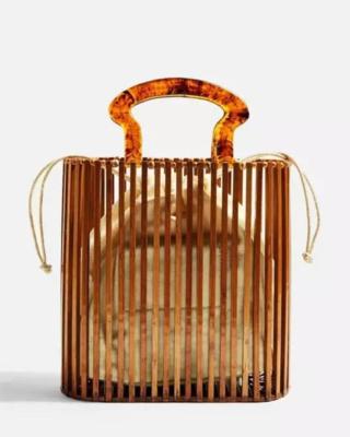 China Natural Bamboo Clutch Bag Straw Woven Round Handbag For Women Hollow Out Bamboo Basket Bag Round Handbag For Women Hollo for sale