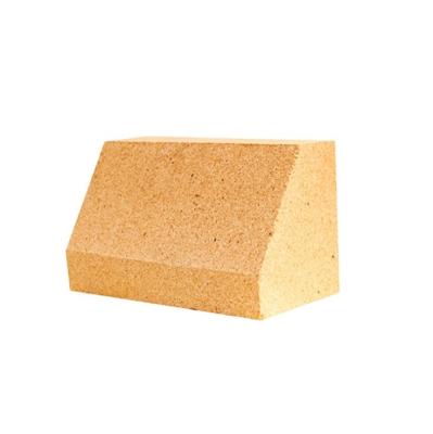 China Durable Construction MgO Content % Fire Clay Curved Wedge Fire Brick for Glass Kiln for sale