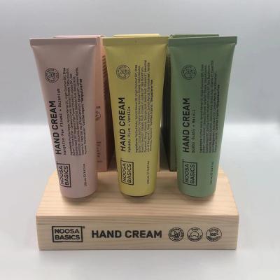 Cina Banco di mostra cosmetico della crema per le mani del supporto dell'esposizione di legno del deposito in vendita