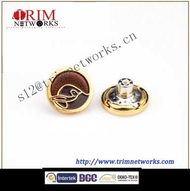 China Alloy jeans 20MM HVS IMI gold with epoxy bird logo surface paste skin plastic inside fashion accessories button for sale