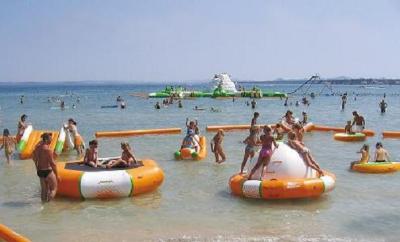 Cina L'aria ha sigillato il parco gonfiabile dell'acqua del trampolino del barbone dell'ammortizzatore ausiliario del trampolino in vendita