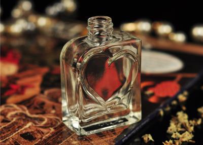 China 30ml Small Glass Perfume Bottles Vintage Silk Printing Heart Shape for sale