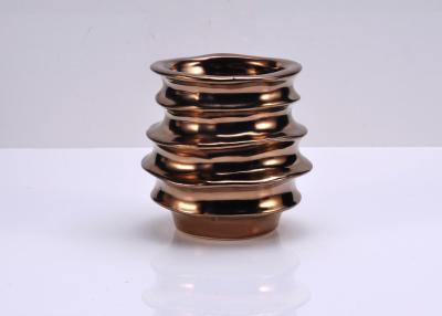 Cina La spirale ceramica placcante dorata del supporto di candela ha inciso il modello in vendita
