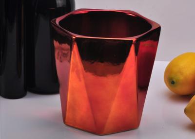 Cina Porta-candela ceramico di esagono colorato oro di Rosa con rivestimento placcante in vendita