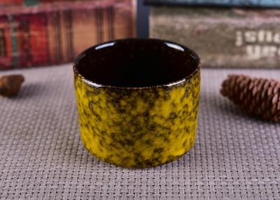 China Do amarelo cerâmico feito a mão dos castiçais da transmutação preto redondo para dentro à venda
