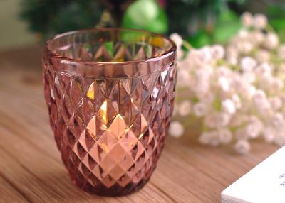 China De mooie gekleurde houders van de glaskaars/duidelijk de houdersdiamant In reliëf gemaakt Patroon van de glas votive kaars Te koop