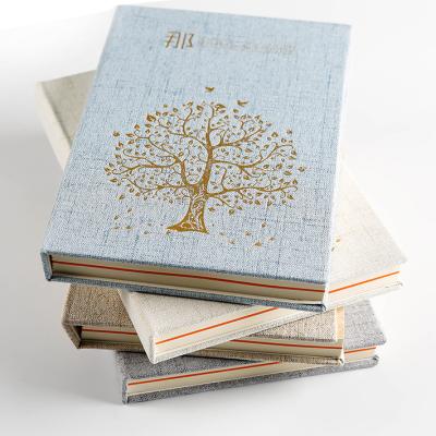 China Debossed LOGO linen fabric hardcover notebook customized design for sale
