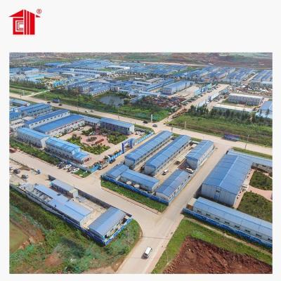 China Customizable T Model Prefab House  Anti Corrosion Q235 Q345 Steel Frame Prefab Homes for sale