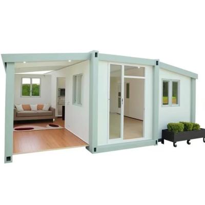 Cina Camera pieghevole a doppia ala Container House con porta in acciaio rosso e stile di design moderno in vendita