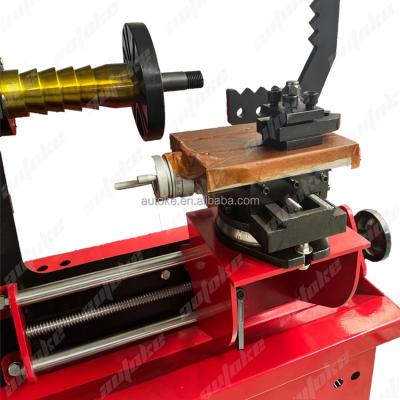 Cina Macchina raddrizzatrice idraulica semiautomatica per cerchi con gamma da 10 a 26 pollici e pressione di 10t in vendita