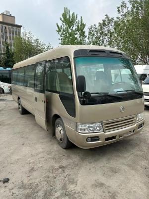 中国 XML6770 28人座 7.7メートル ゴールデンドラゴン 中古バス シャンパン ゴールド フロントエンジン 販売のため