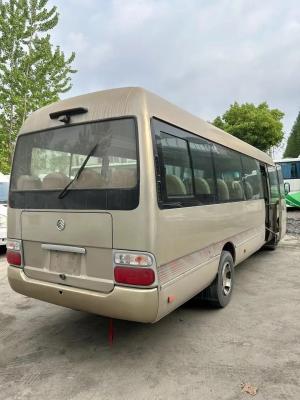 中国 XML6770 28人座 7.7メートル ゴールデンドラゴン 中古バス シャンパン ゴールド フロントエンジン 販売のため