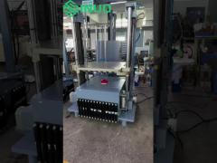 Sistema hidráulico de ensayo de choque vertical con generador de onda de medio seno
