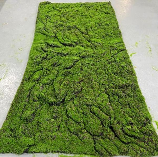 Tappeto di fondo per decorazioni esterne con muschio emulativo verde