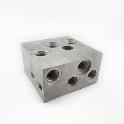 Cina Blocco manifold idraulico in acciaio al carbonio personalizzato completamente personalizzabile e conforme alla RoHs in vendita