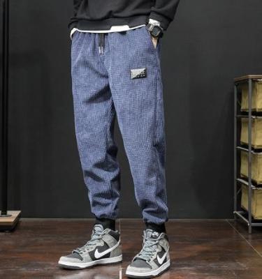 Cina Pantaloni lunghi dei pantaloni casuali del velluto a coste dell'abbigliamento della fabbrica degli uomini su ordinazione della Cina con il cordone in vendita