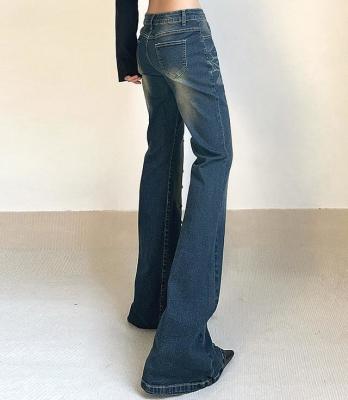 Cina Apertura della gamba della vita bassa casuale dei jeans delle donne dei produttori di abbigliamento di piccolo ordine ampia con il ribattino in vendita