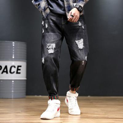 Cina Pantaloni a nove punte Haren in poliestere con logo personalizzato Jeans blu scuro larghi in vendita