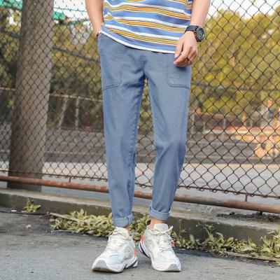 Cina Il denim degli uomini dell'harem dell'estate della primavera ansima i jeans della vita del cordone con le grandi tasche in vendita