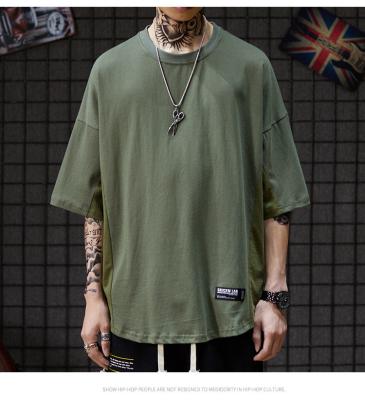 中国 綿の平野の人のためのXXLのHip HopのTシャツへの緩い低下の肩の特大ティーXS 販売のため