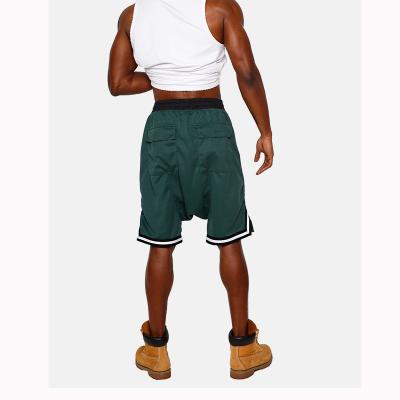 Cina Gli uomini di piccola impresa mette gli sport in cortocircuito Mesh Sling Breathable Loose Pants in vendita