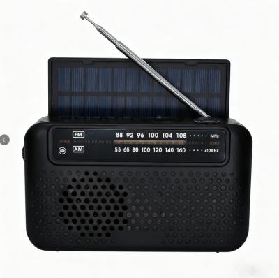 China Portable Handle charging Super Bass Usb Tf FM AM Radio Solar Power Speaker With Flash Light for sale