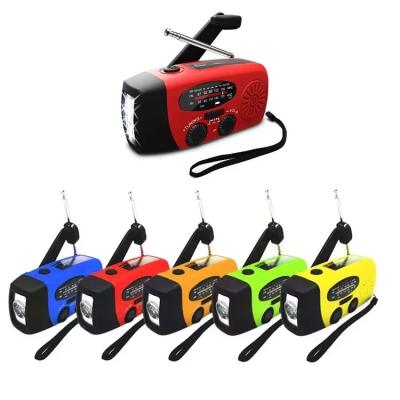 China Ungraded Rechargeable Solar Crank AM/FM/SW 3 Band Radio Brightness LED Flashlight Mobile Phone Charger Alarm Clock for Camping for sale