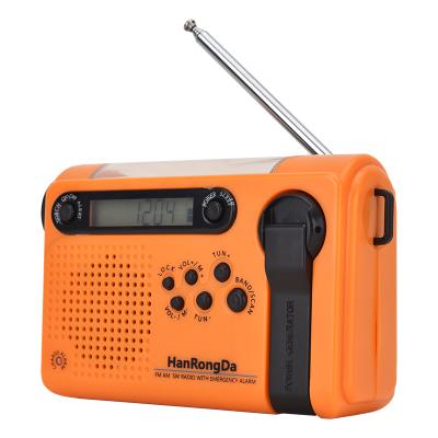 China Emergency Portable AM FM Radio with LCD Display Solar Dynamo Crank and Built-In Lithium Battery Dual-Band Weather Speaker Radio for sale