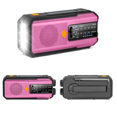 China Outdoor Survival Hot Sales 5000mAh Crank Solar Dynamo Hand Charger Self-Powered 3-Band AM/FM Emergency Radio with Flashlight for sale