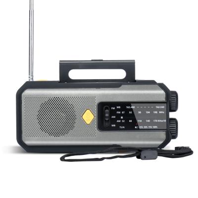 China Mini Portable Emergency 5000mAh Plastic Battery Solar Radio Rechargeable Powerbank USB AM/FM Radio Built-In Speaker SOS Alarm for sale