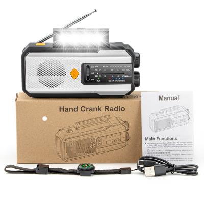 China Emergency Solar Hand-Crank Radio AM/FM Weather Radio with Flashlight Reading Lamp Phone Charger Power Bank for sale