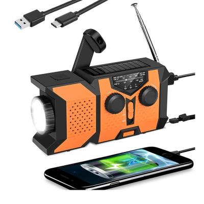 China Solar Emergency Hand Crank Portable FM Radio with Flashlight, 2000MAh Power Bank Phone Charger and Solar Power for Emergencies for sale