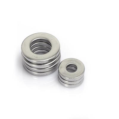 China Zinc Plated Corrosion Resistant Hardness DIN6797 Flat Spring Washer Nuts for sale