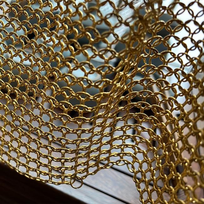 Detailed view of chainmail ring mesh structure