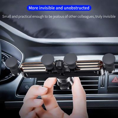 China Mini Gravity Car Phone Holders For 65-88MM Mobile Phones for sale