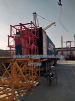 China Cable Building Material Elevator SS100/100 2t Load Two Cage 800mm Mast for sale