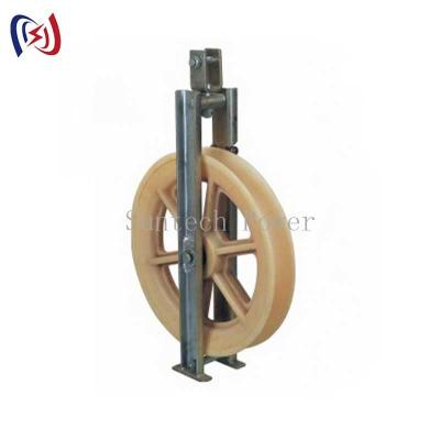 China Professional 20KN Rated Load OPGW Cable Stringing Block with 660X110mm Size and Non-Metallic Liner for Safe Fiber Optic Ground Wire Installation for sale