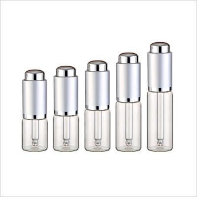China 7ml 8ml 10ml 12ml 15ml Cosmetic Glass Bottle Silver Press Dropper Cap for sale