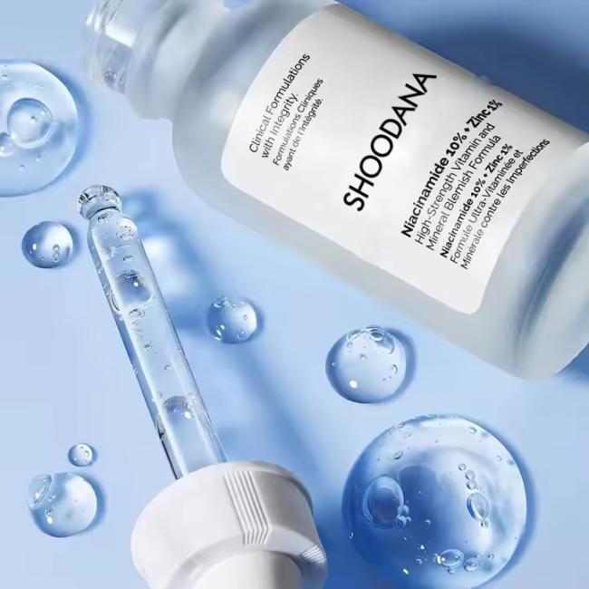 Close-up of Vitamin C Serum application