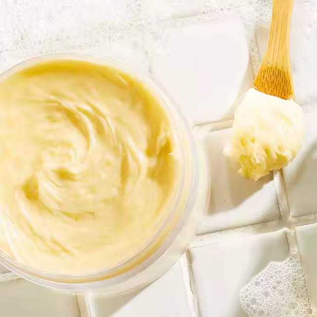 Body butter application on skin demonstration