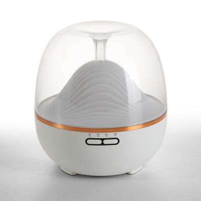 中国 600ml卸し売り装飾的な無線木製の穀物の超音波香料入りの精油部屋の香りの拡散器多彩なLEDのライト 販売のため