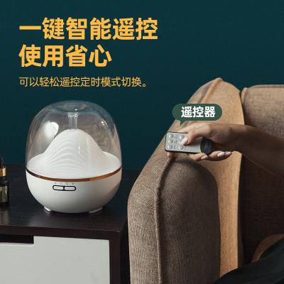 中国 600ml卸し売り装飾的な無線木製の穀物の超音波香料入りの精油部屋の香りの拡散器多彩なLEDのライト 販売のため