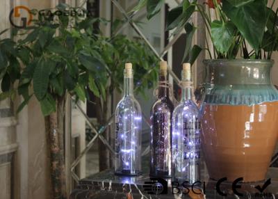 Cina la bottiglia di vino di vetro a pile con le luci principali fa festa il regalo o la luce notturna della decorazione in vendita