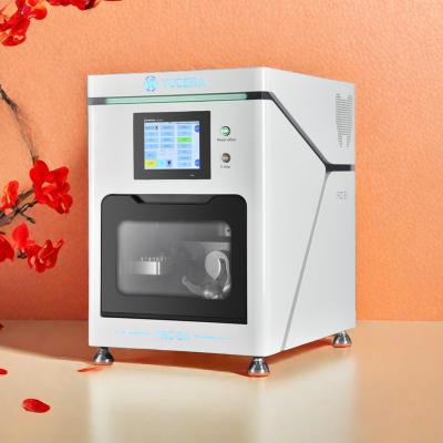 Cina Fresatrice dentale ad alta precisione in zirconia Yucera 5 assi CNC per la progettazione CAD CAM di corone e protesi in vendita