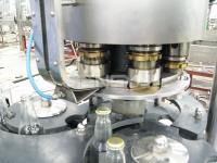 China Automatic 6 Heads Crown Cap Capping Machine with 3000 BPH Capacity for Beer and Beverage Bottles for sale