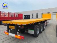 China 40FT Flat Bed Load Capacity Trailers 40 Ton Tri Axle Flatbed Container Semi Trailers for sale