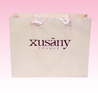 2017 custom elegant folded shopping paper bag with gold embossed logo