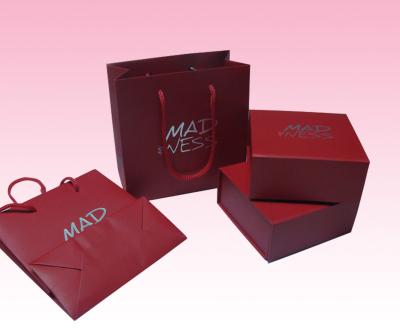 China custom luxury CMYK color folded paper perfume box with embossed logo for sale