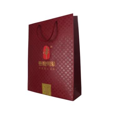 China custom small paper bag packaging for shoes with glossy lamination supplier for sale