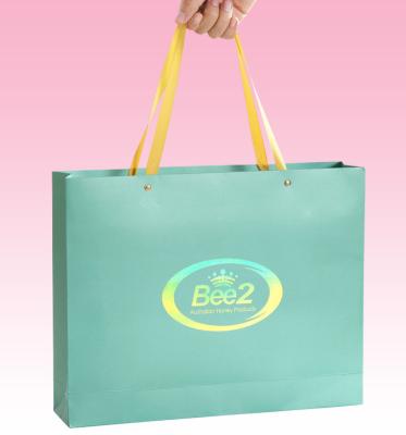 China custom buy paper bags manufacturer with hologram stamping logo for sale